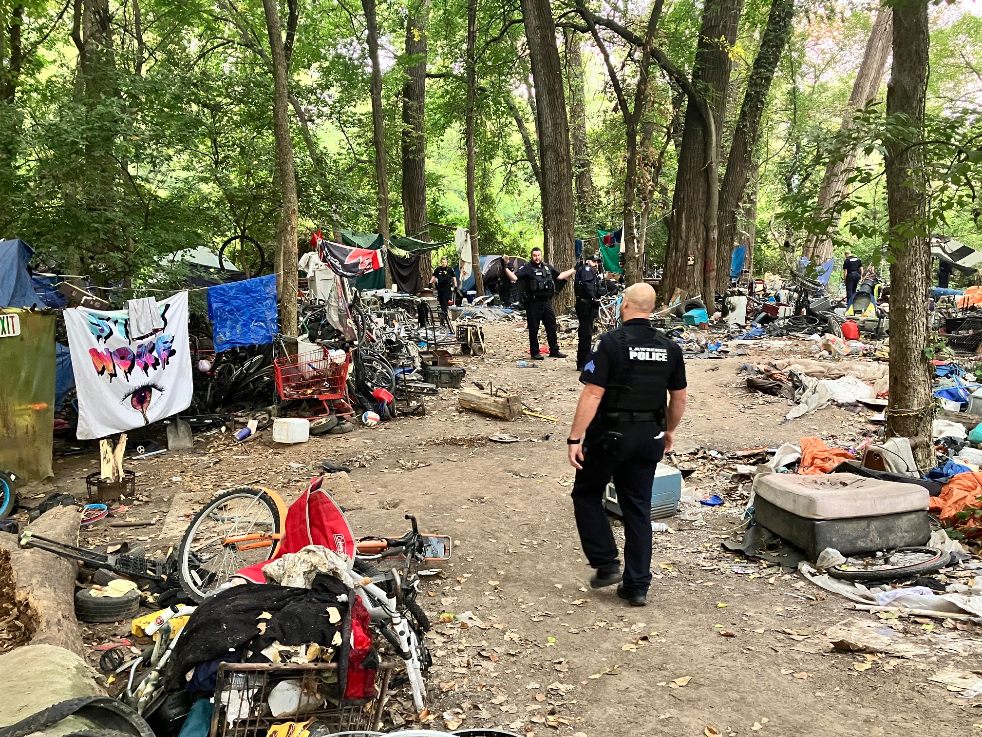 Police assist remaining campers out of Burcham Park ahead of 2nd ...